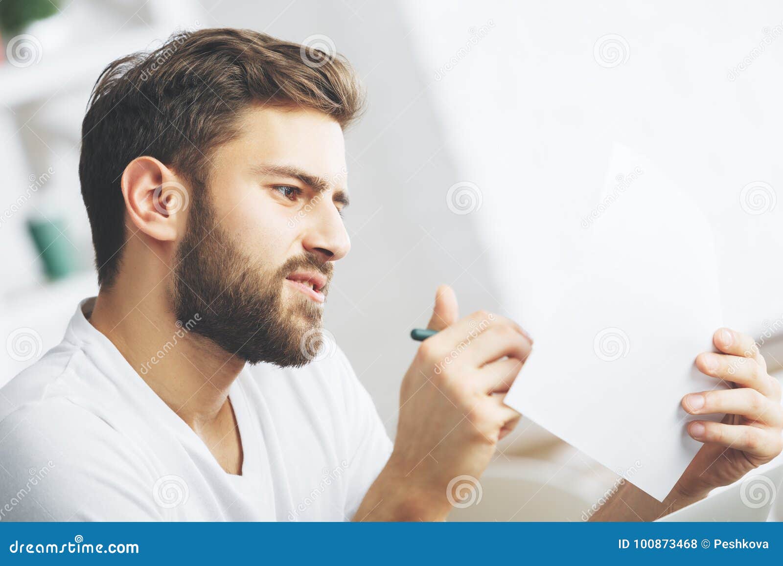 White Man Examining Document Side Stock Photo - Image of insurance ...