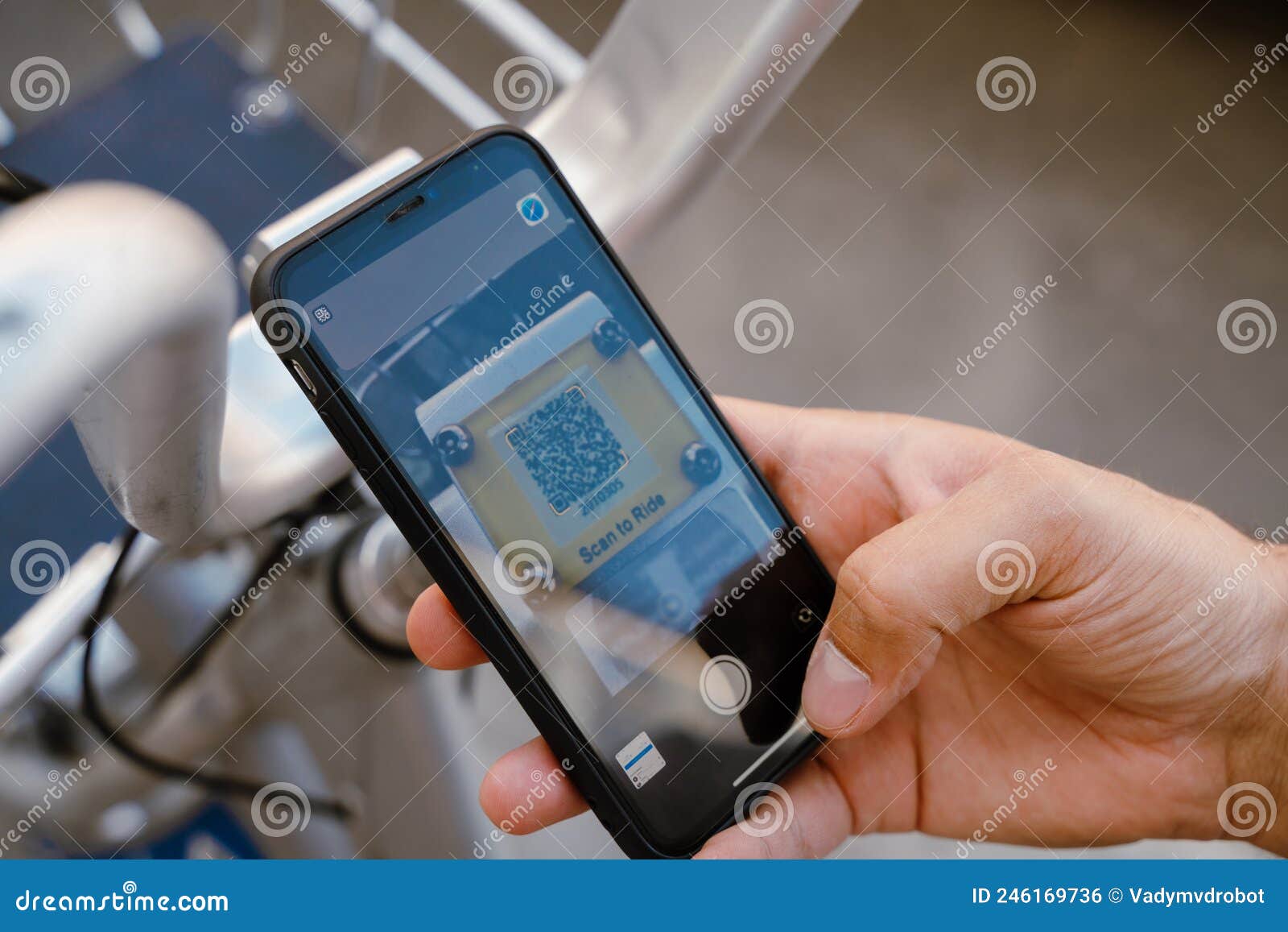 White Man Scanning Qr-code with Cellphone for Bicycle Rental Stock ...