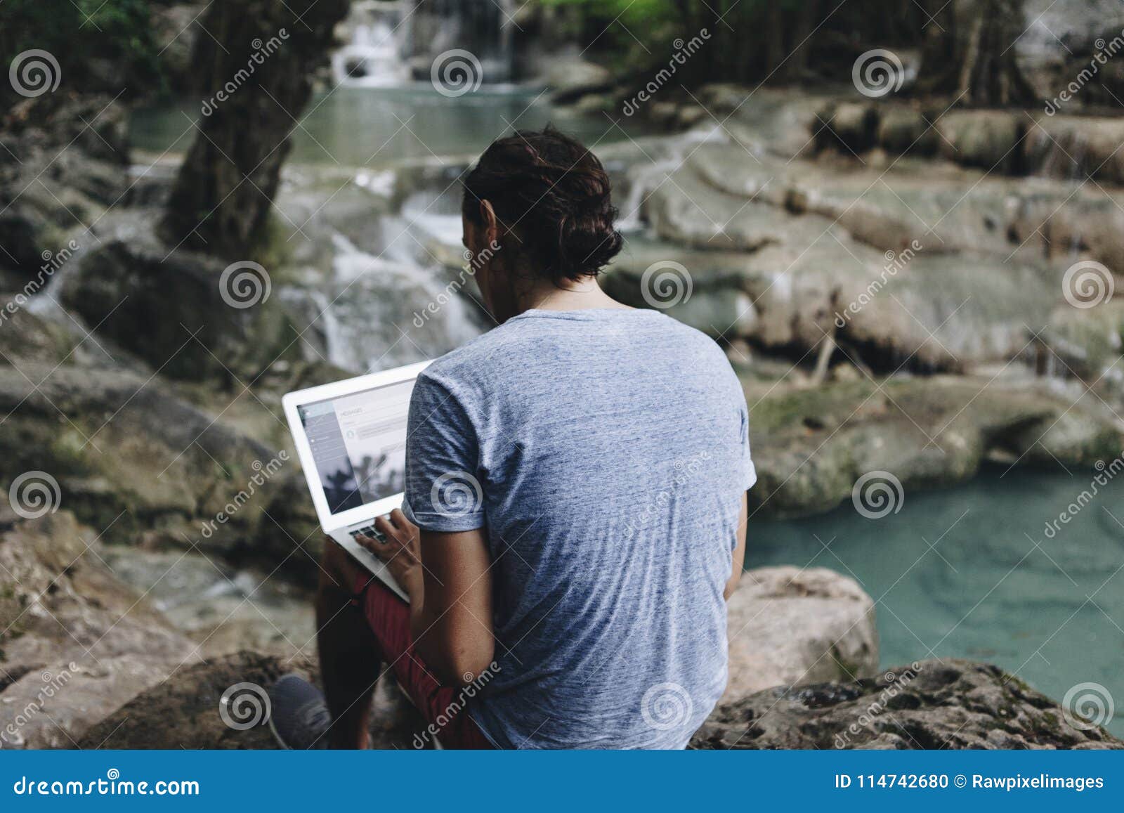 White Man Using Computer Laptop at Waterfall Stock Photo - Image of ...