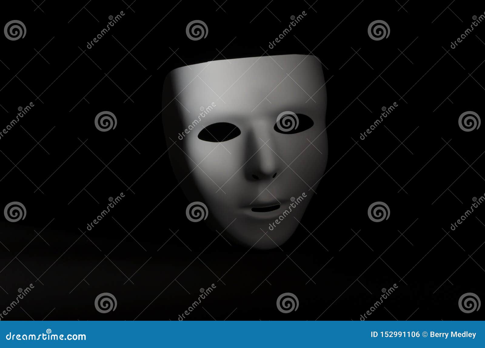 White Masquerade Mask in Shadow Stock Photo - Image of halloween, black ...