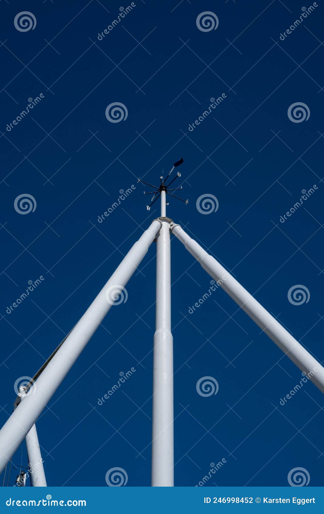 On the White Mast There is a Wind Direction Indicator Stock Photo ...