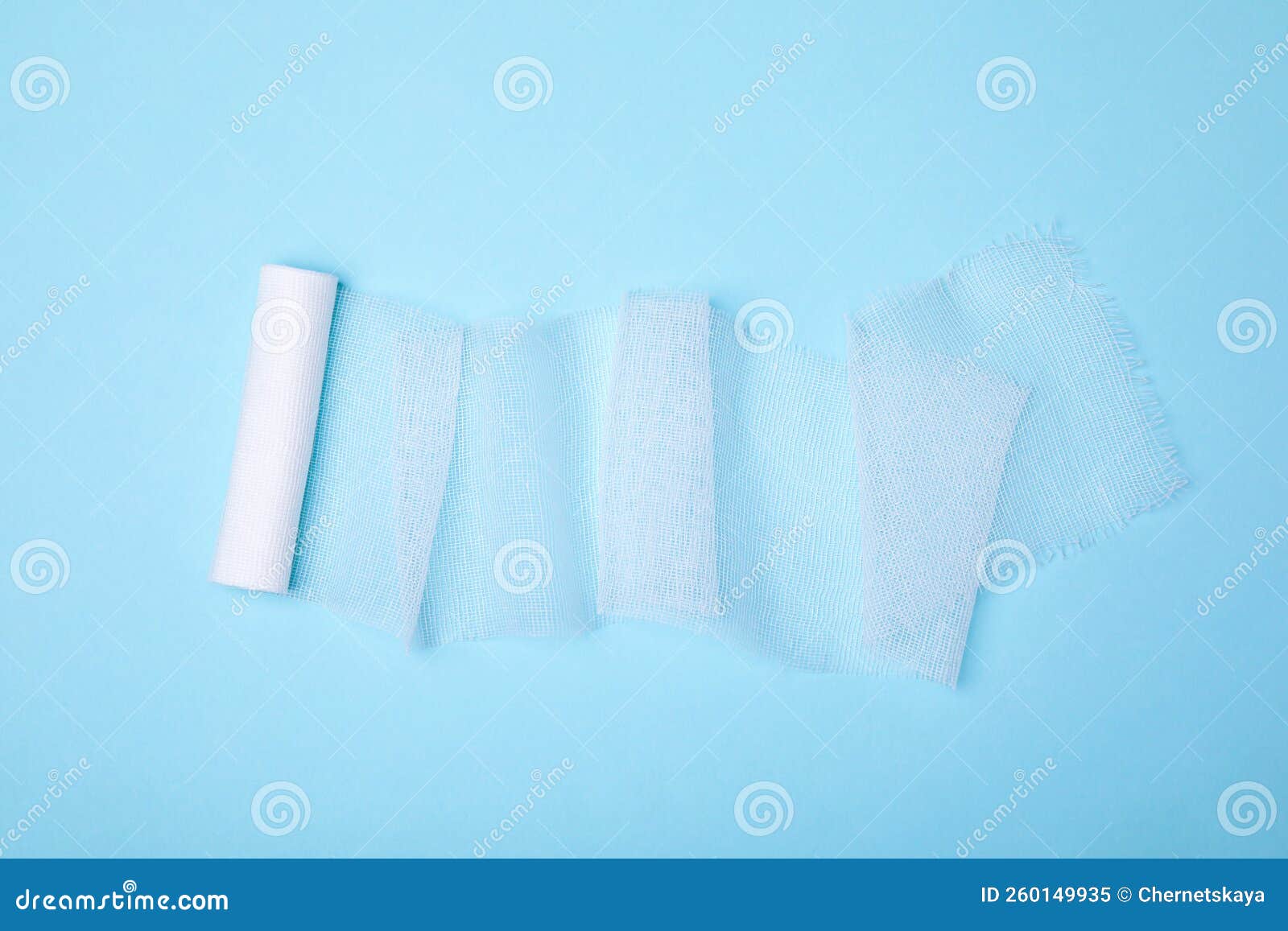 White Medical Bandage on Light Blue Background, Top View Stock Image ...