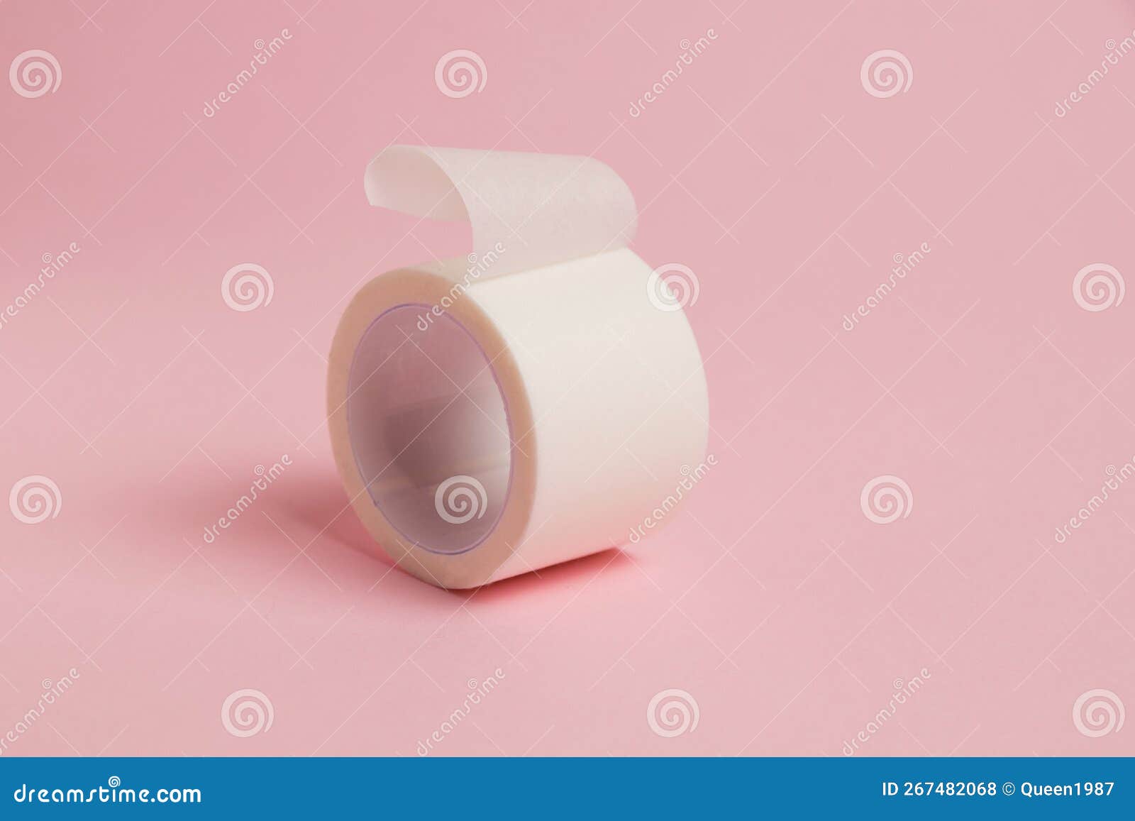White Medical Patch on a Paper Base, for Applying Bandages, on a Pink ...
