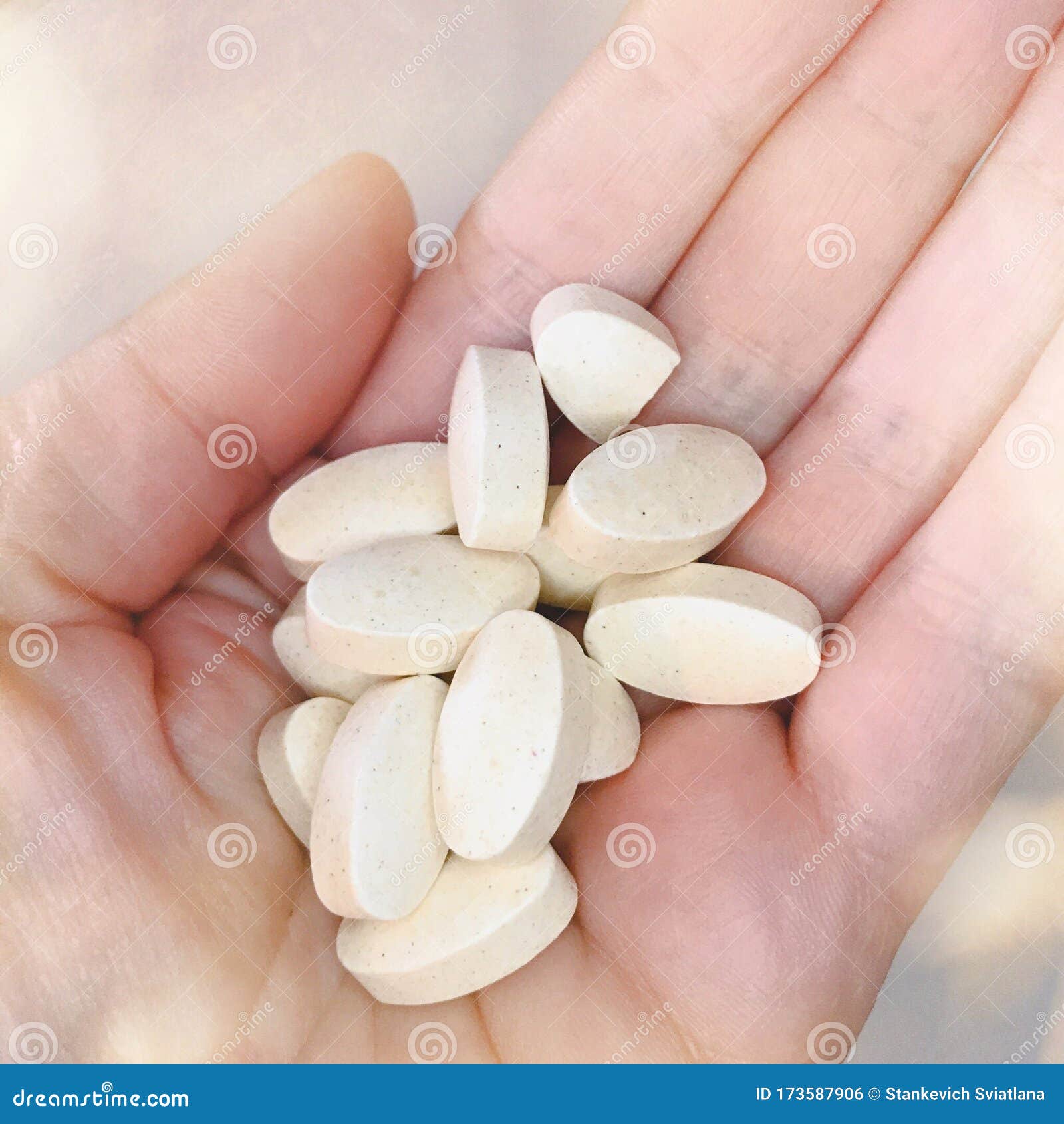 White Medicinal Tablets in the Hands of a Person Stock Photo - Image of ...