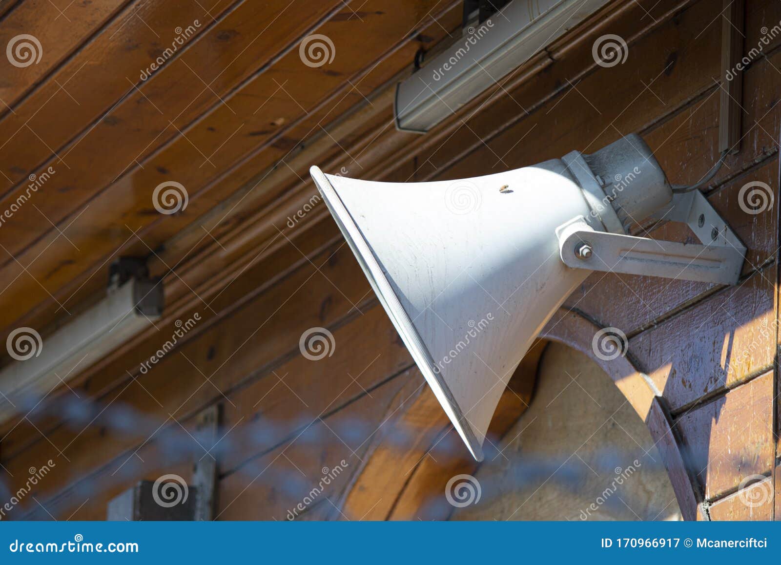 White Megaphone Hanging on a Wood Wall Stock Image - Image of concept ...