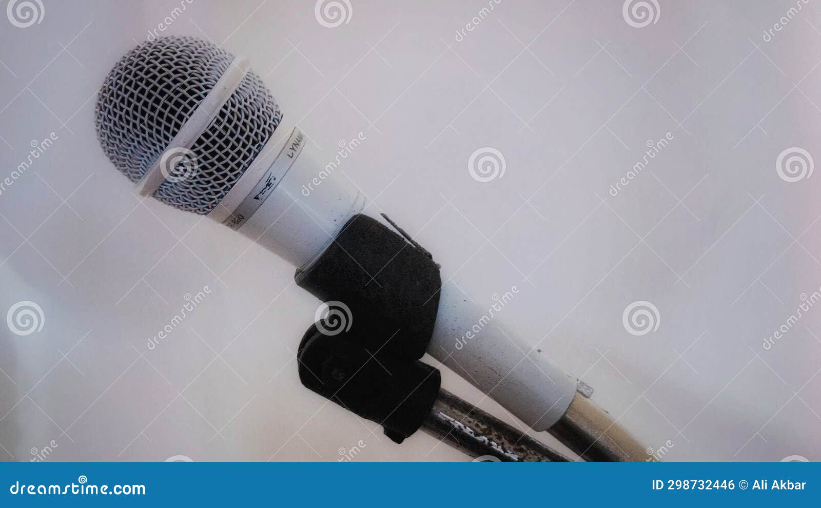 A White Mic Above Standing Mic Stock Photo - Image of background ...