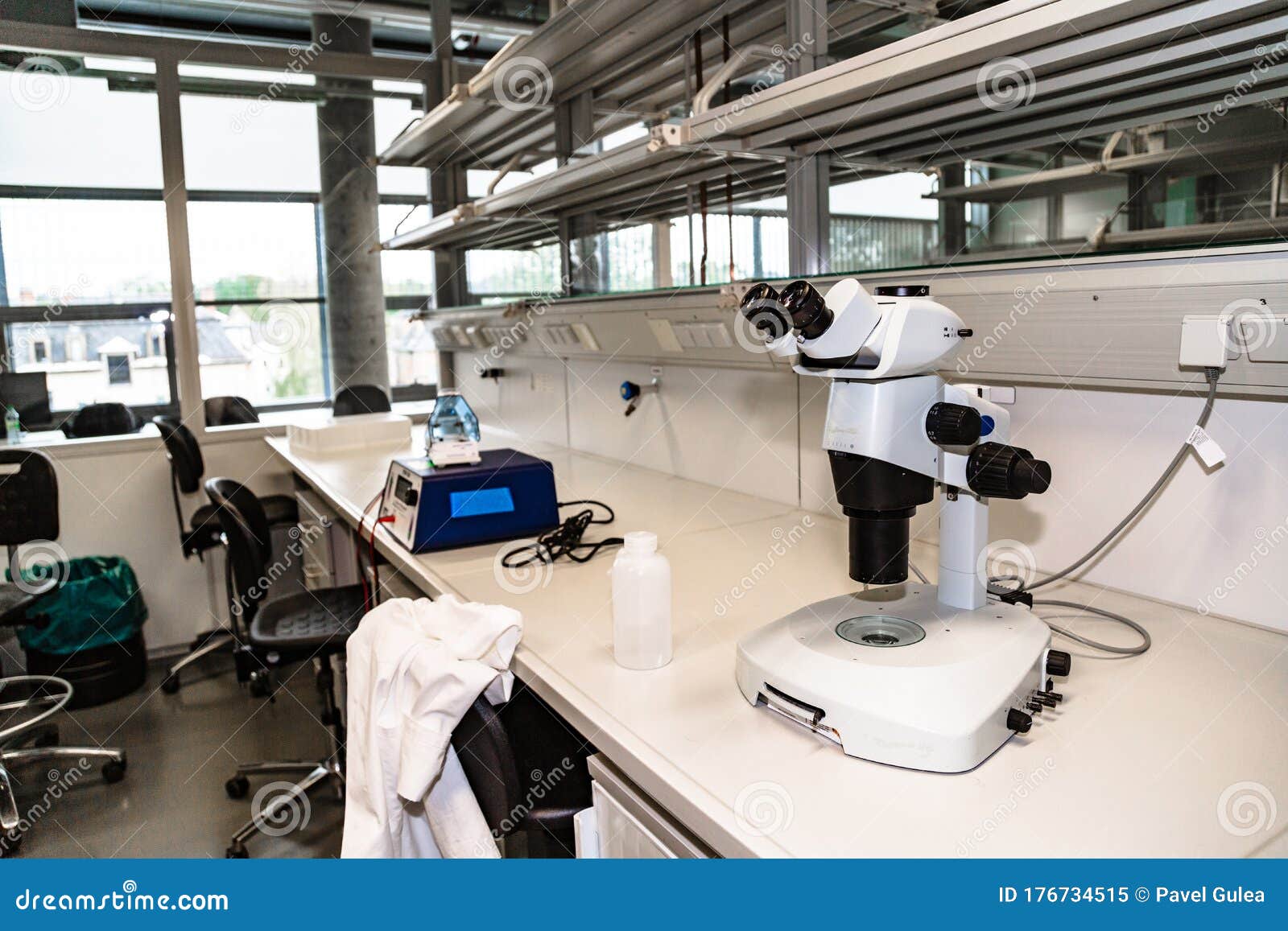 White Microscope Stands in Laboratory on Table Stock Image - Image of ...