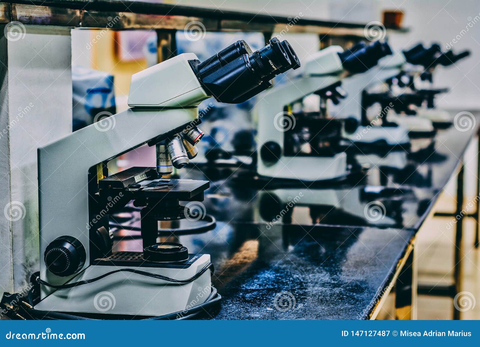 White Microscope on Top of Black Table Stock Image - Image of ...