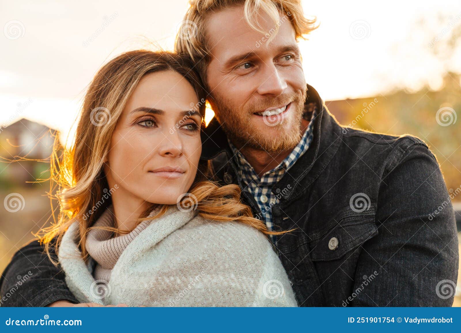 White Mid Couple Smiling and Hugging while Standing Together Stock ...