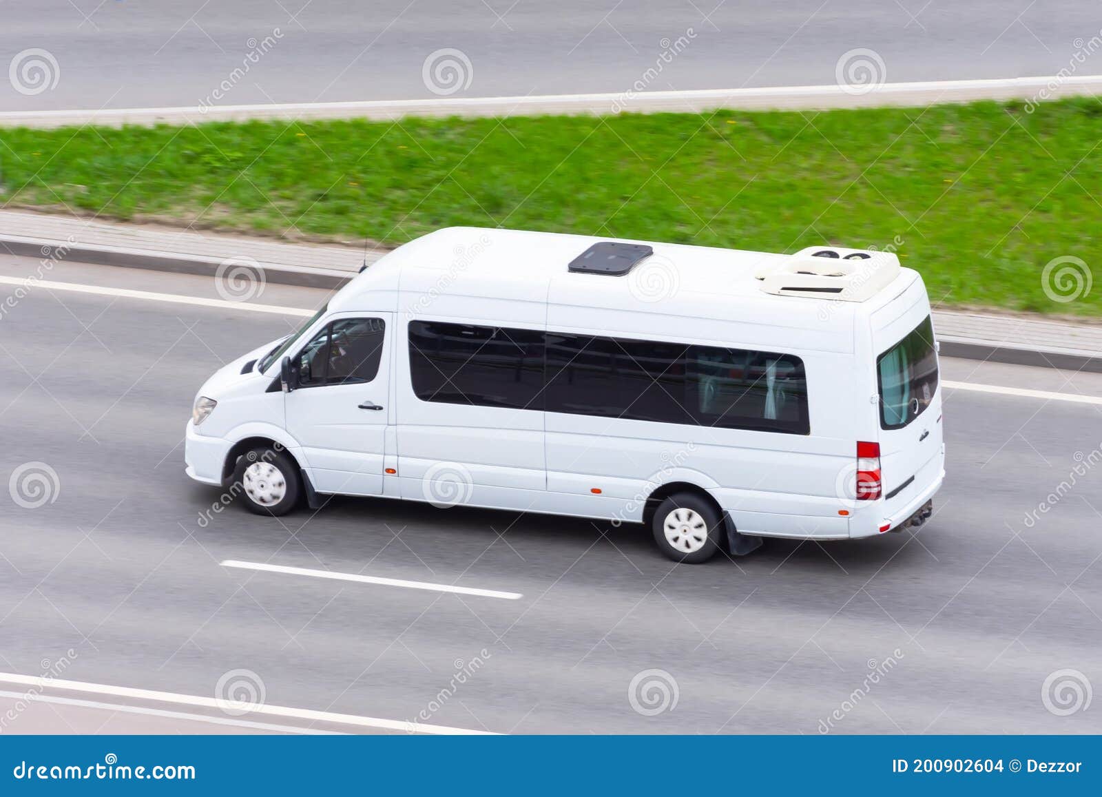 White Minibus Goes on the City Highway Street Stock Photo - Image of ...