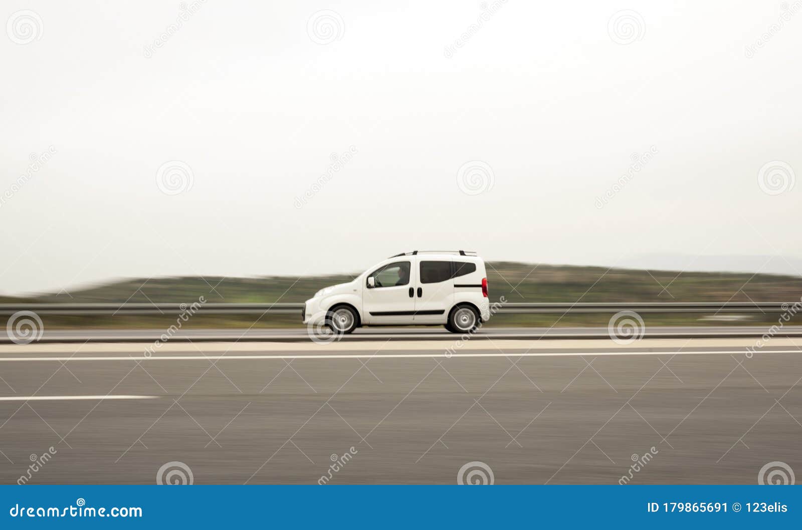 White minivan on highway stock image. Image of freight - 179865691