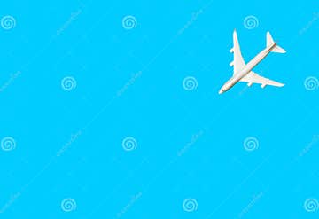 White Model of Passenger Plane on Blue Background Stock Image - Image ...