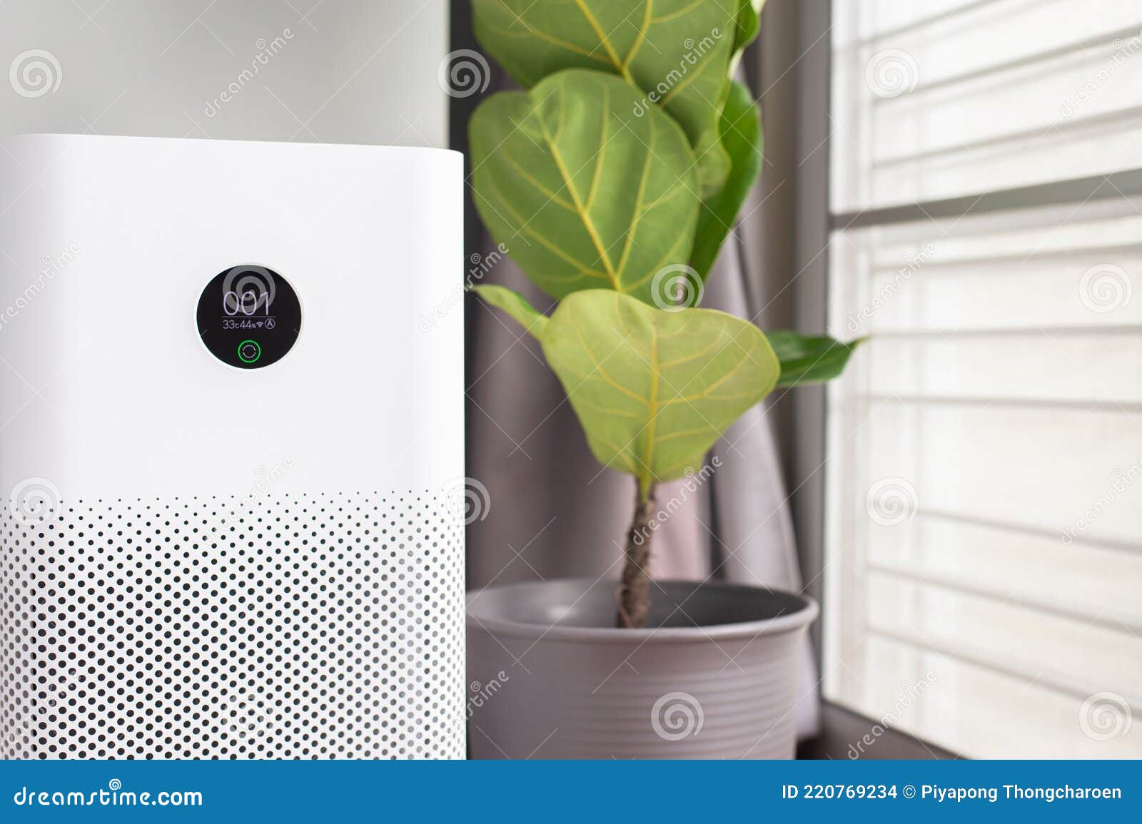 White Modern Air Purifier in a Living Room for Refresh Air Flow at Home ...