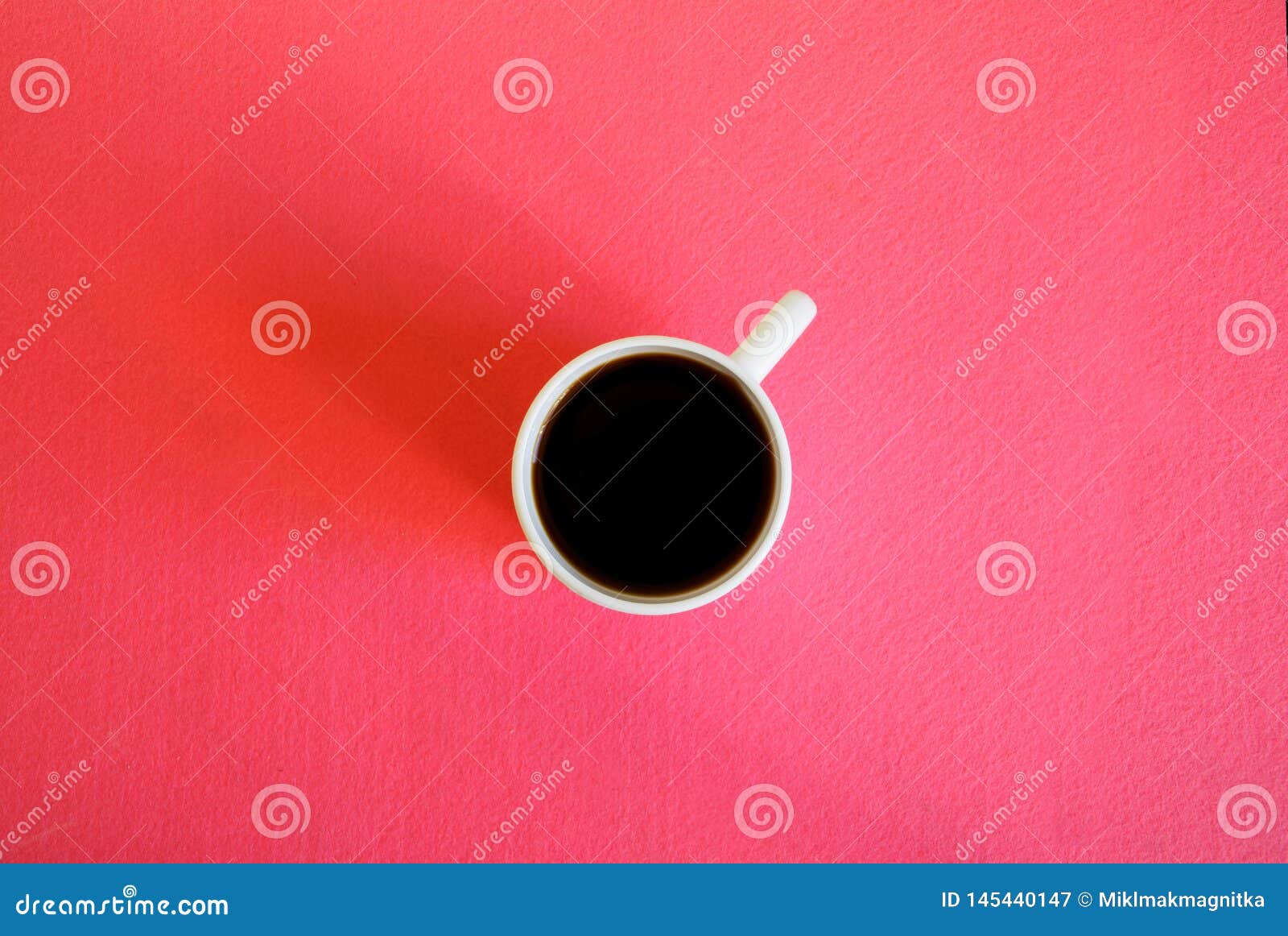 White Mug with Black Coffee on a Pink Surface. View from Above Stock ...