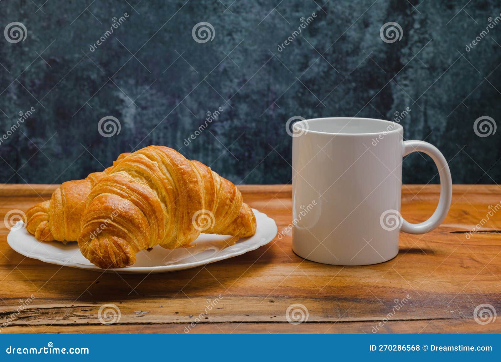 White Mug and Croissants on Wooden Table. Stock Photo - Image of ...