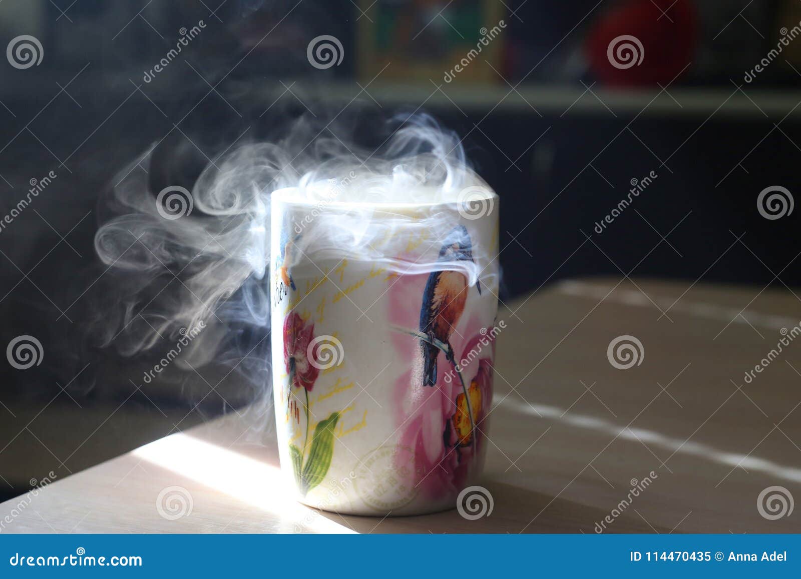 Mug with smoke on a table stock image. Image of liquid - 114470435
