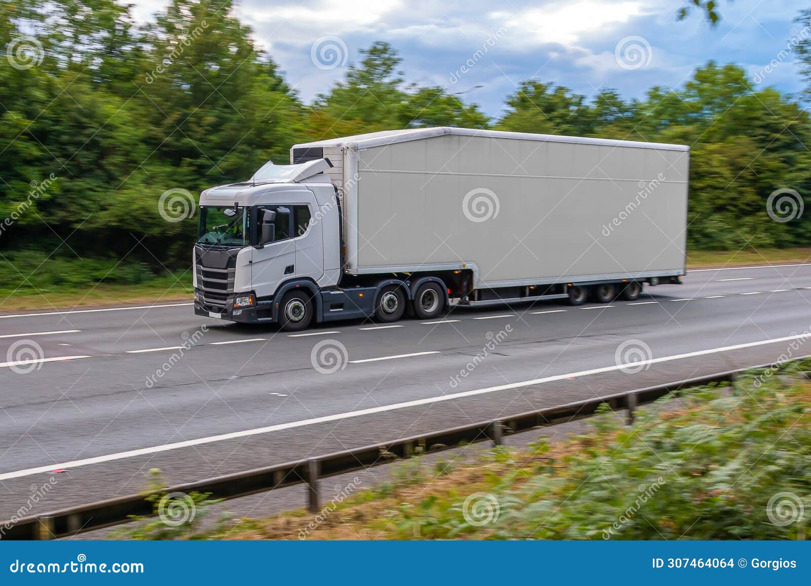 White No Name Double Decker Lorry in Motion on the Motorway. Stock ...