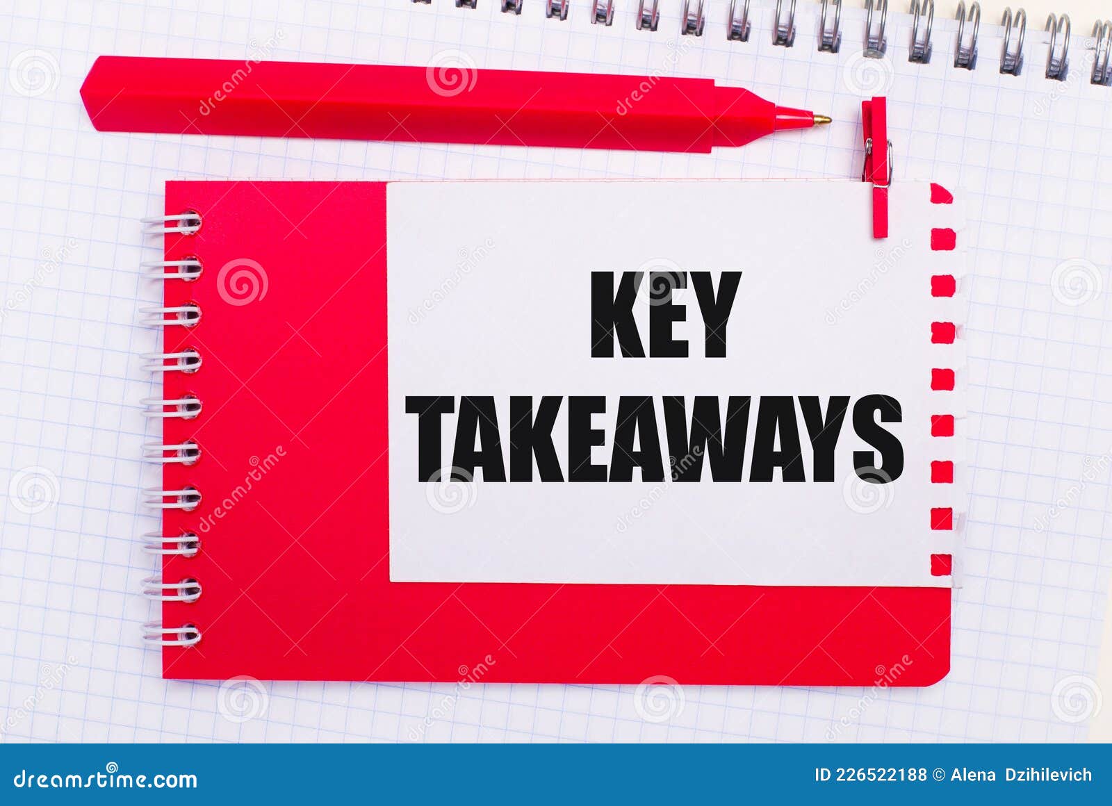 On a White Notepad, a Red Pen, a Red Notepad and a White Sheet of Paper ...