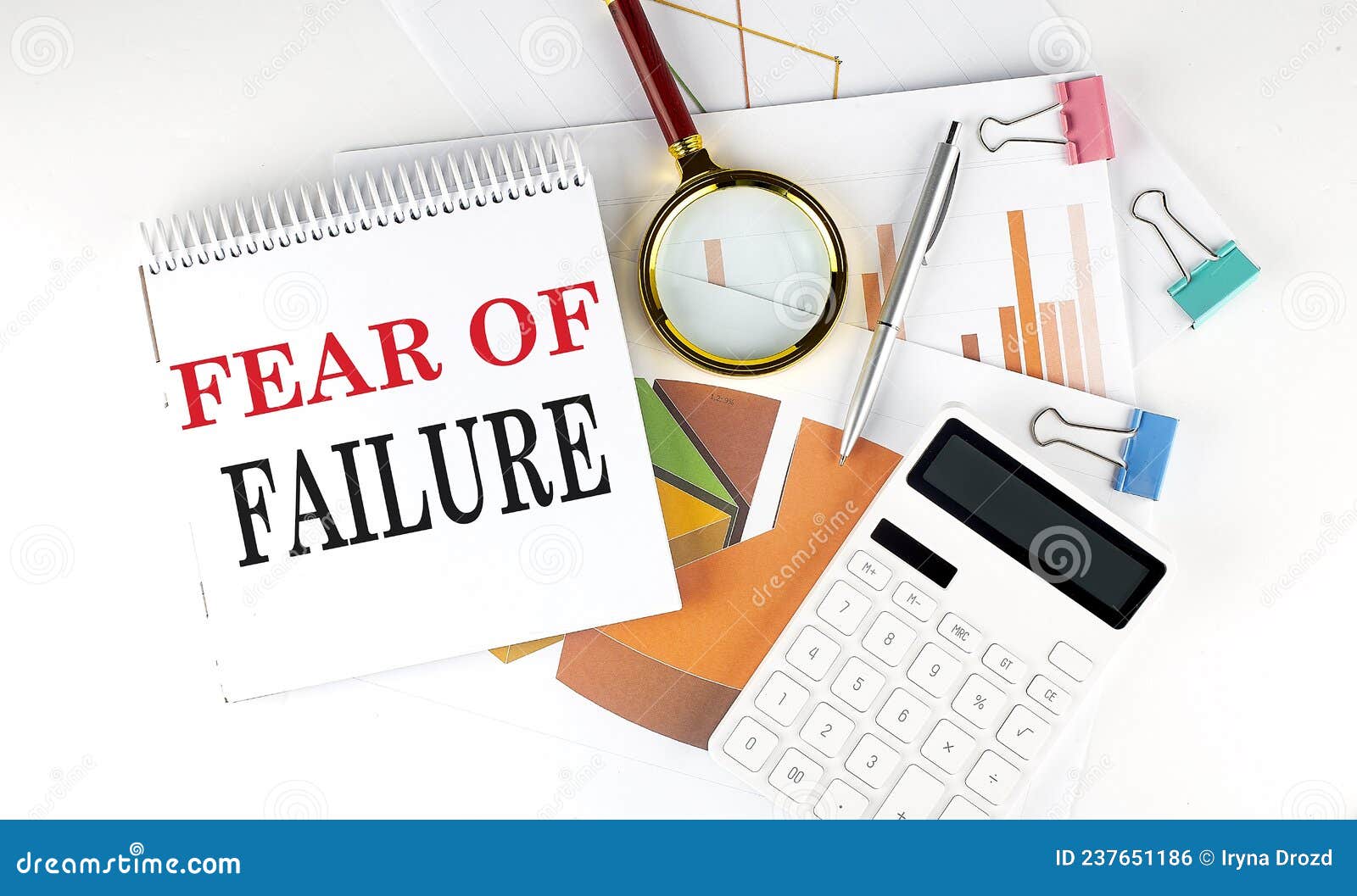 White Notepad Text FEAR of FAILURE with Diagram,chart,calculator on the ...