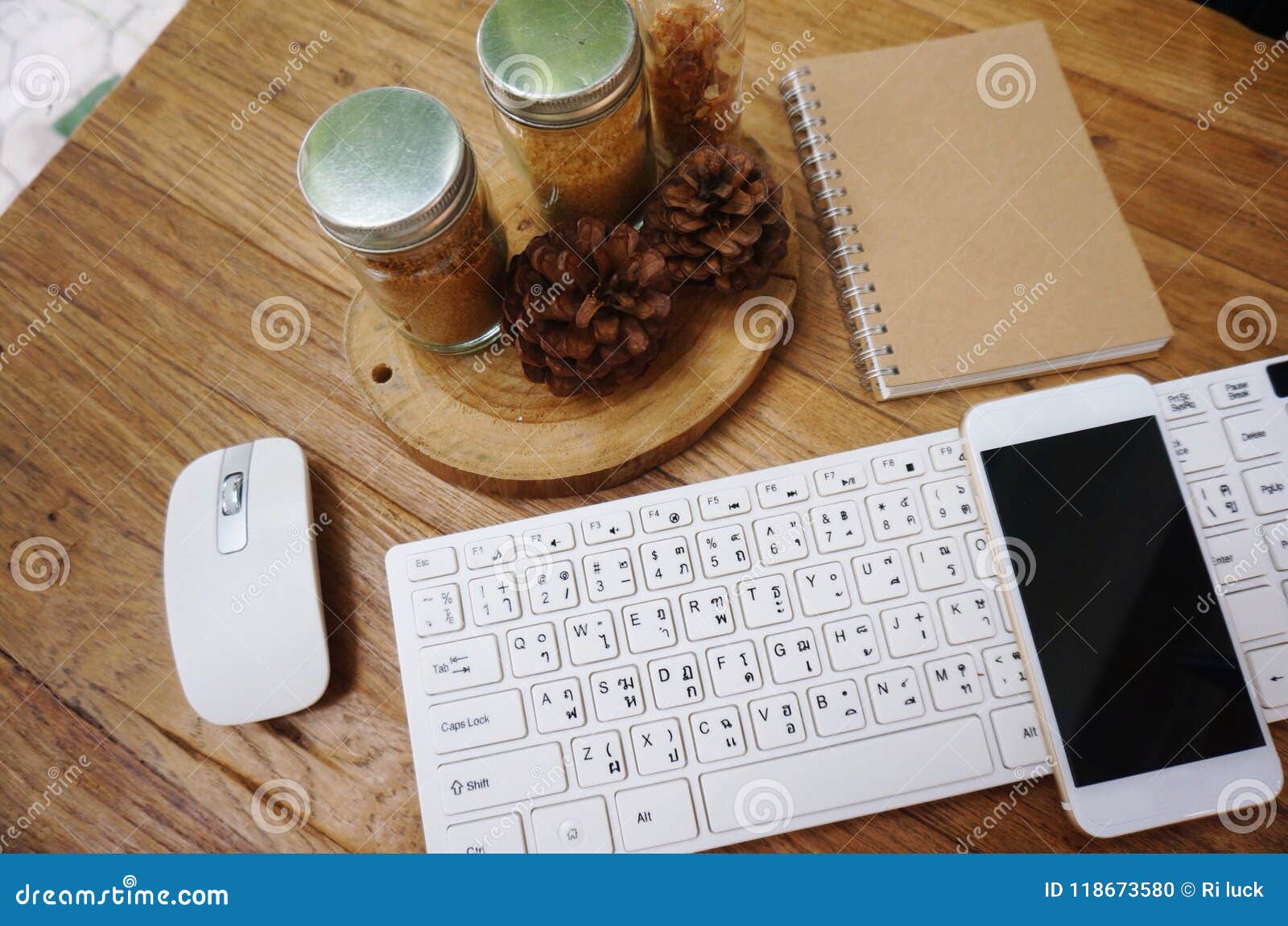 White Office Desk Table with a Lot of Things on it. Stock Photo - Image ...