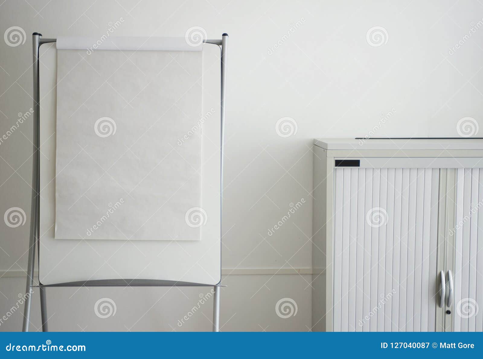White Office with a White Flip Chart Stock Image - Image of cupboard ...