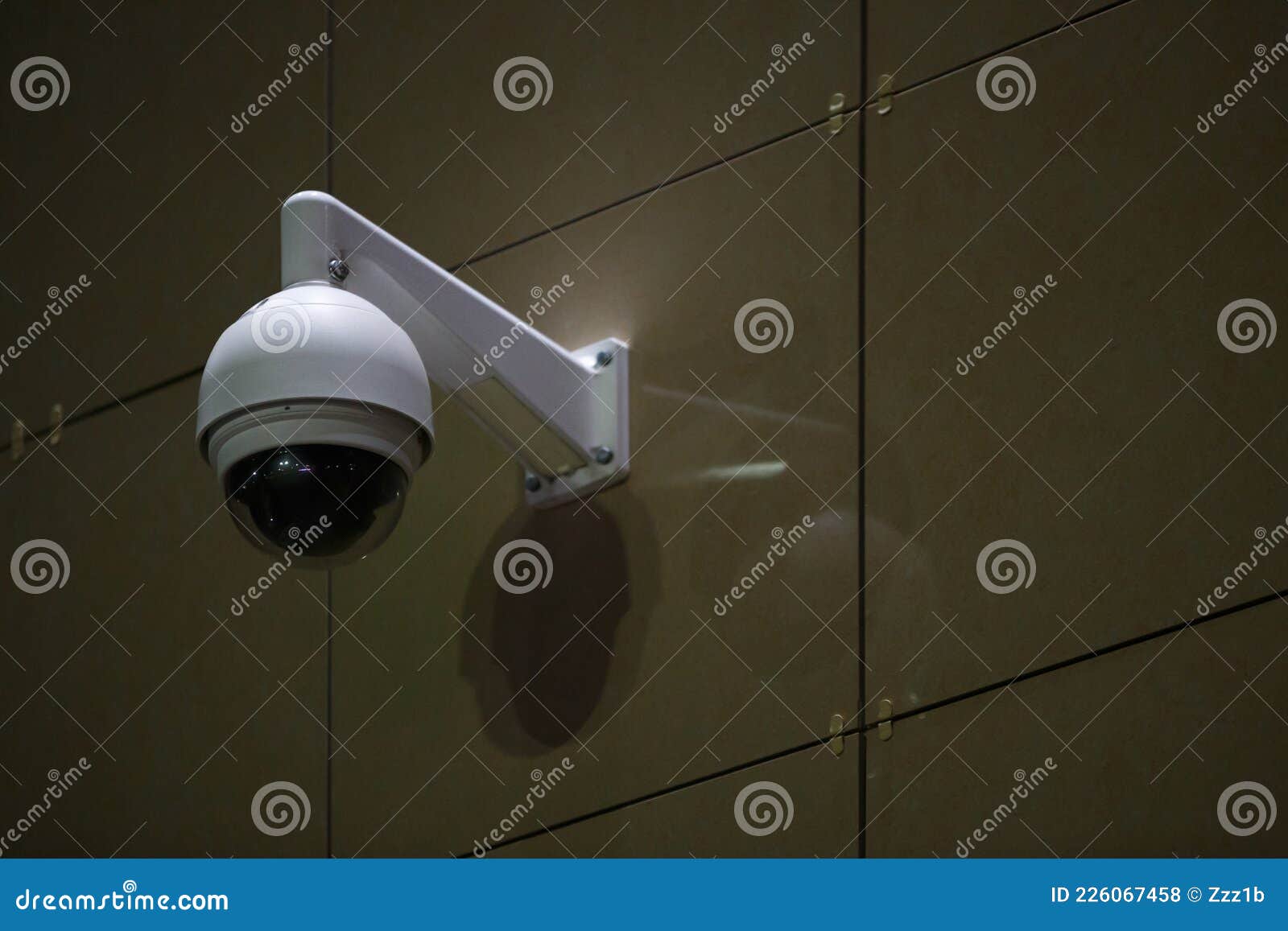 360 Degree Ball Surveillance Security Camera on Building Wall at Night ...