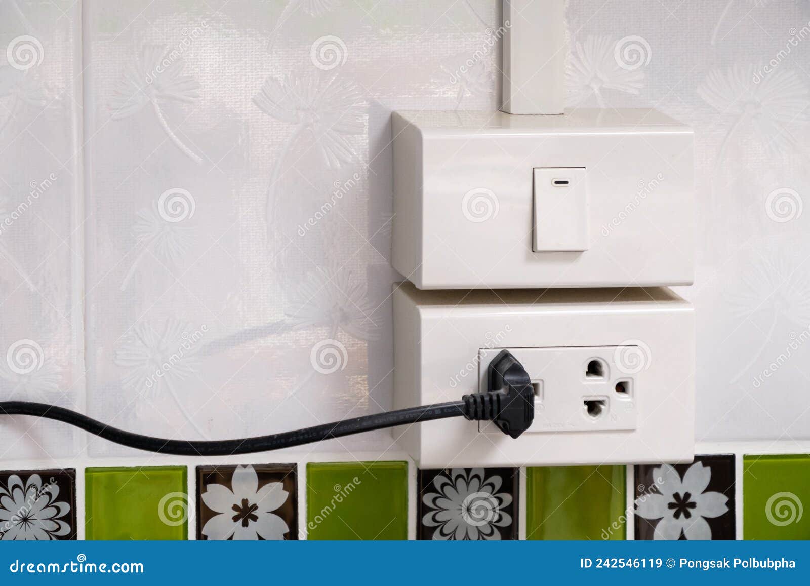 The White Outlet with the Socket of the Refrigerator on the Tile Wall ...