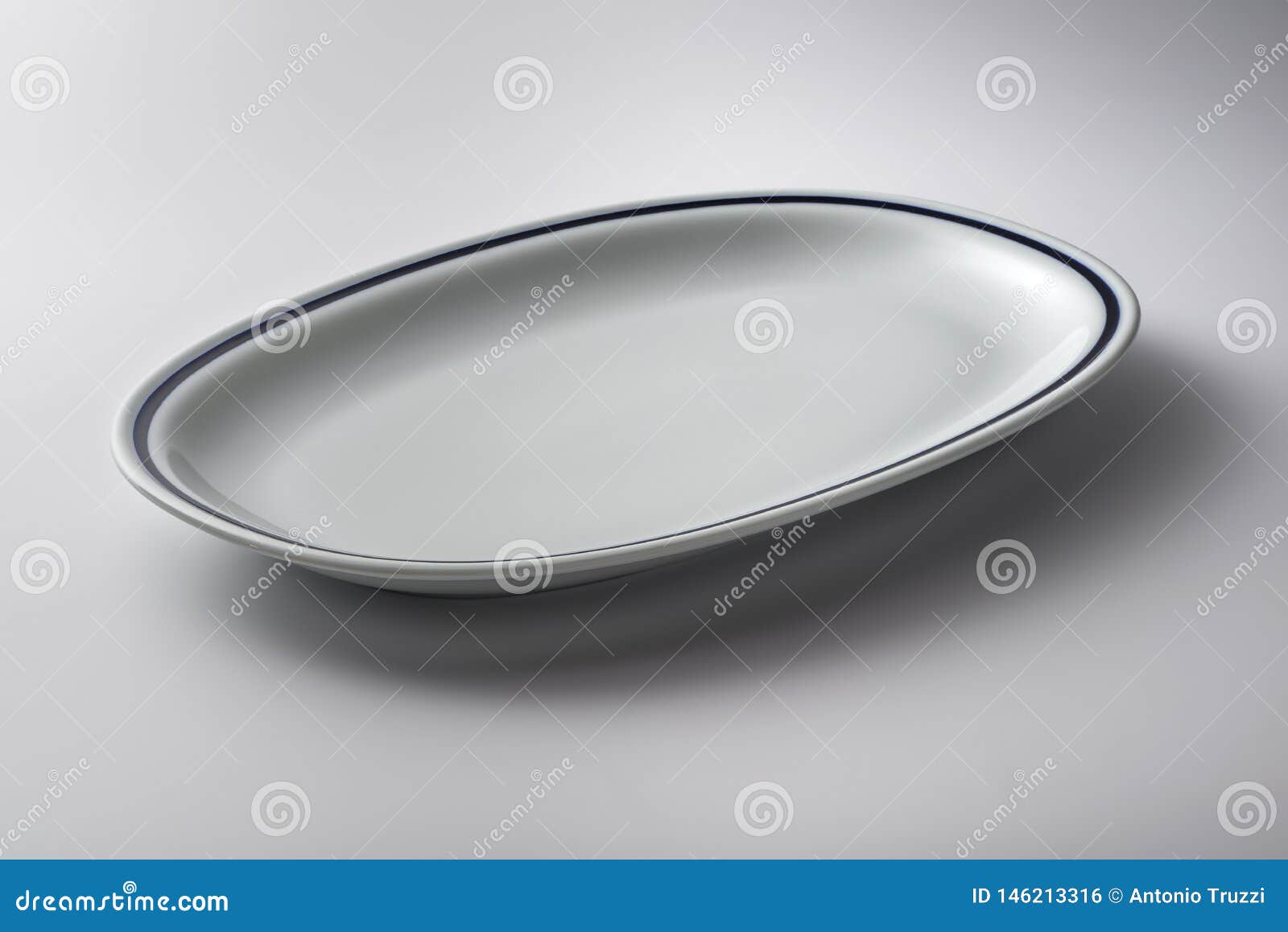 White Oval Plate with Blue Line on the Edge Stock Photo - Image of flat ...