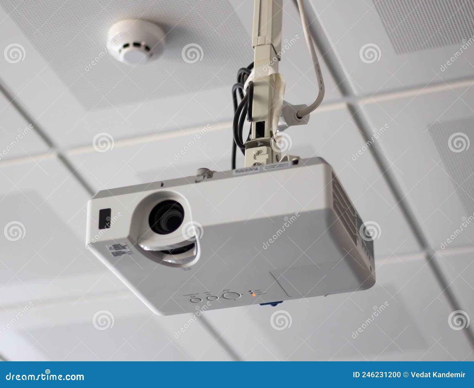 White Overhead Multimedia Projector Hanging on the Ceiling Stock Photo ...