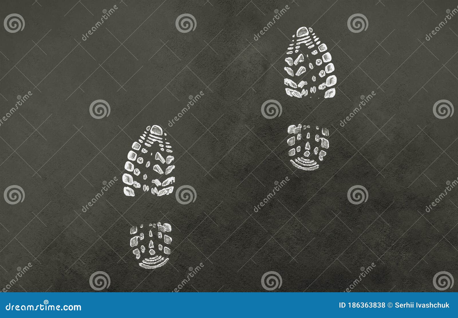 White Paint Footprints from Shoes on a Black Surface Stock Photo ...