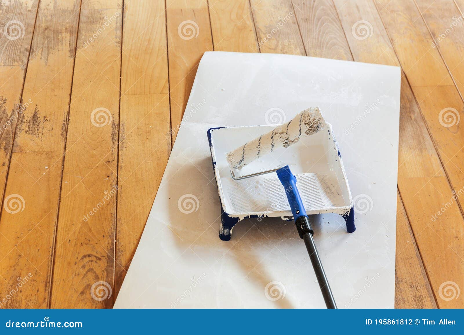 White Paint Roller Ready To Start Painting Surfaces Stock Photo - Image ...