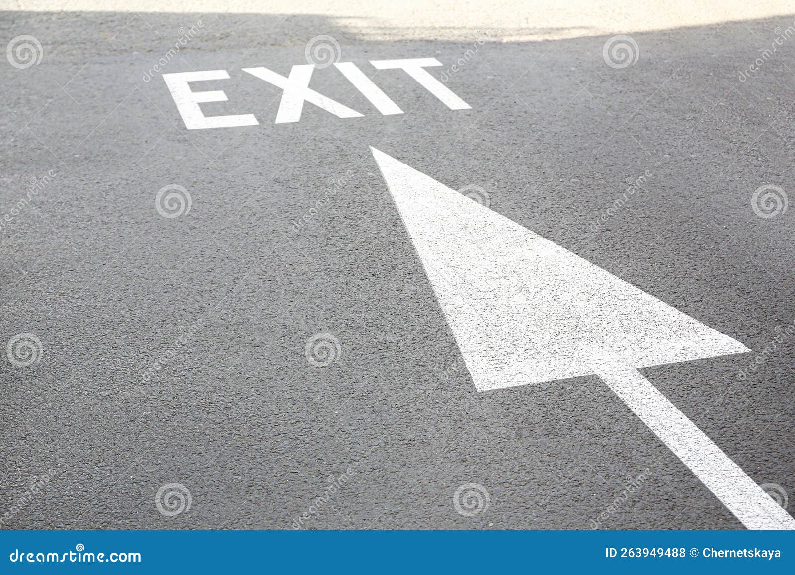 White Painted Arrow and Exit Marking on Road Outdoors Stock Photo ...