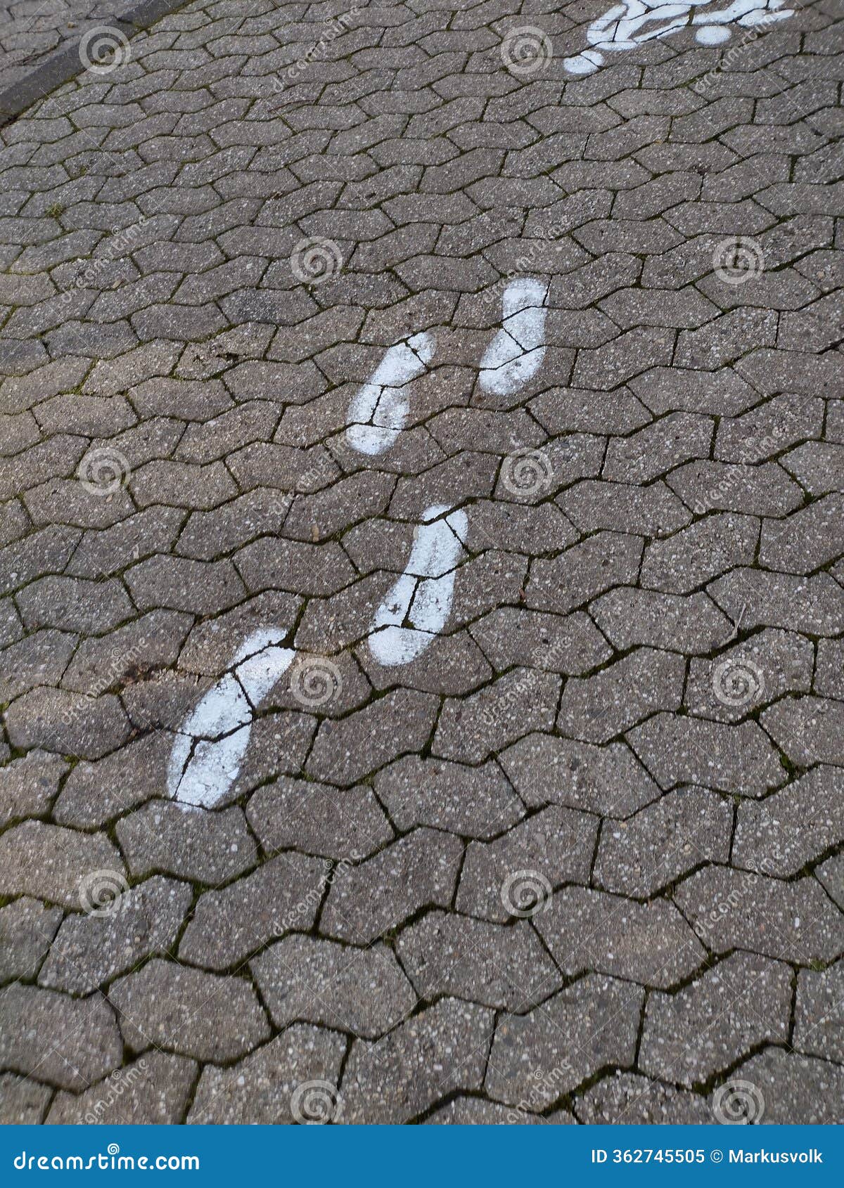 White Painted Footstepts on the Street Stock Image - Image of stones ...