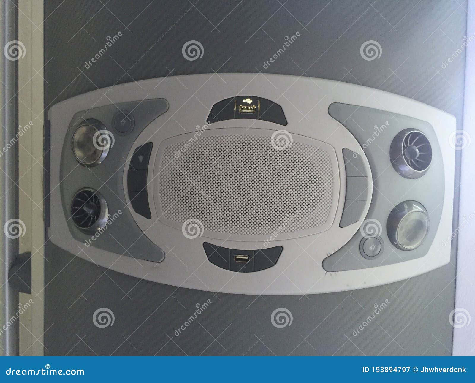 A Panel Inside a Bus with Usb-chargers, Air Conditioner and a Light ...