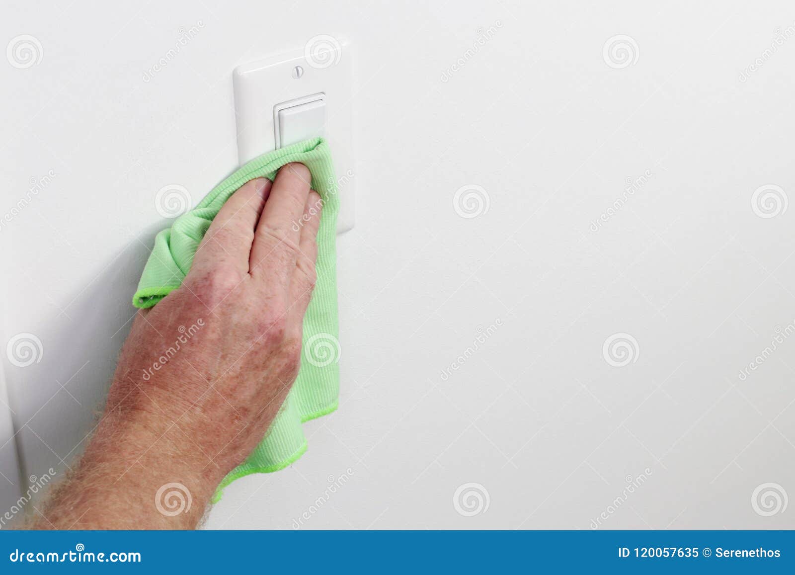 Hand Cleaning Light Switch Panel with Green Cloth Stock Image - Image ...