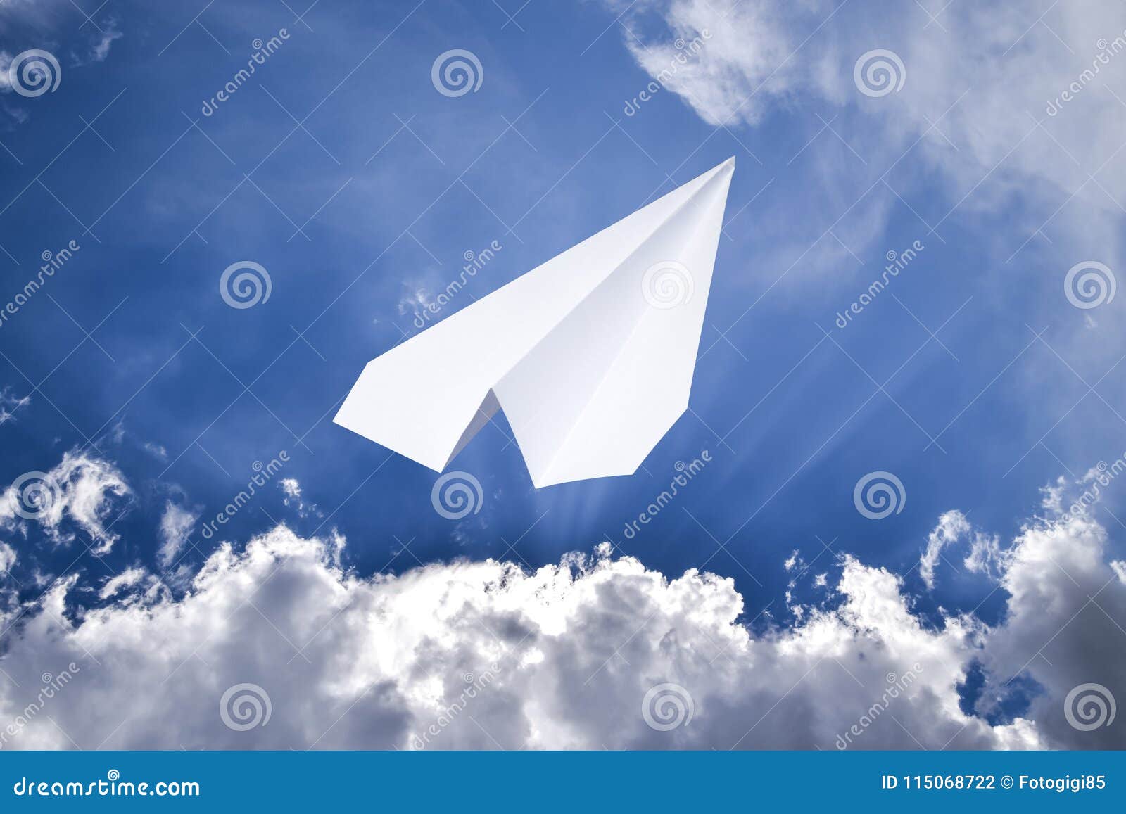 White Paper Airplane in a Blue Sky with Clouds. the Message Symbol in ...