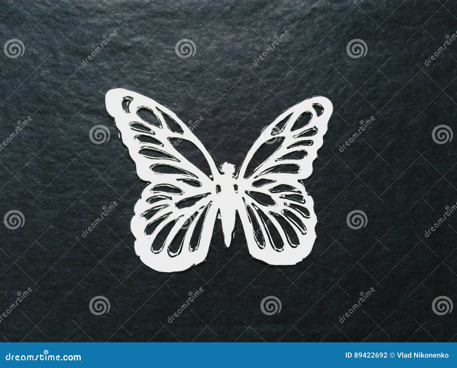 White Paper Butterfly on a Black Background Stock Photo - Image of ...