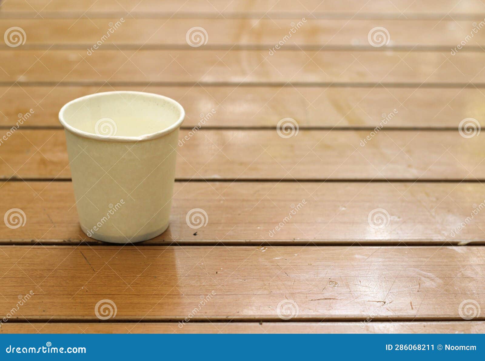 A White Paper Cup Place on the Table Stock Image - Image of table ...