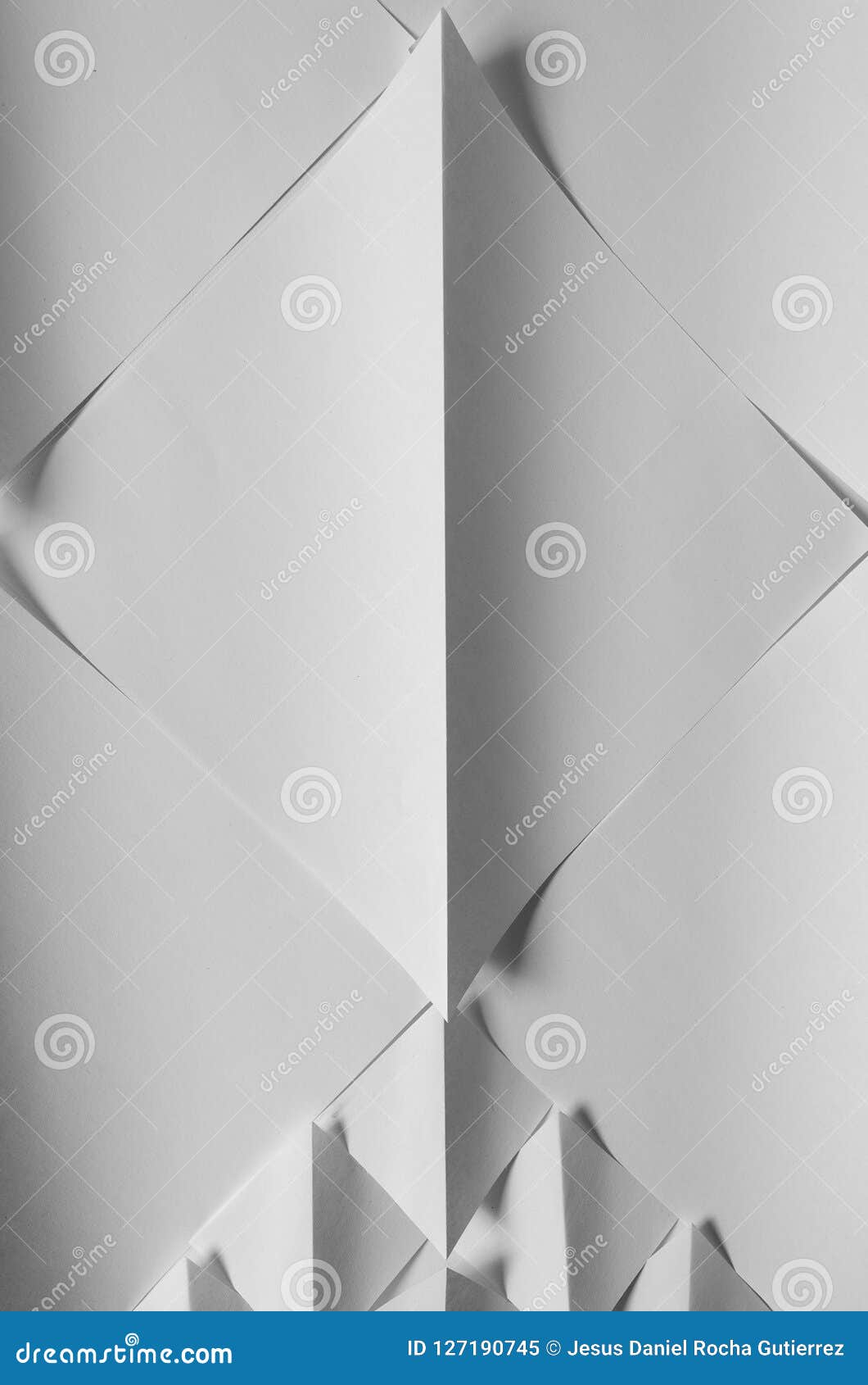 White Paper Folded into Square and Triangular Shapes Stock Image ...