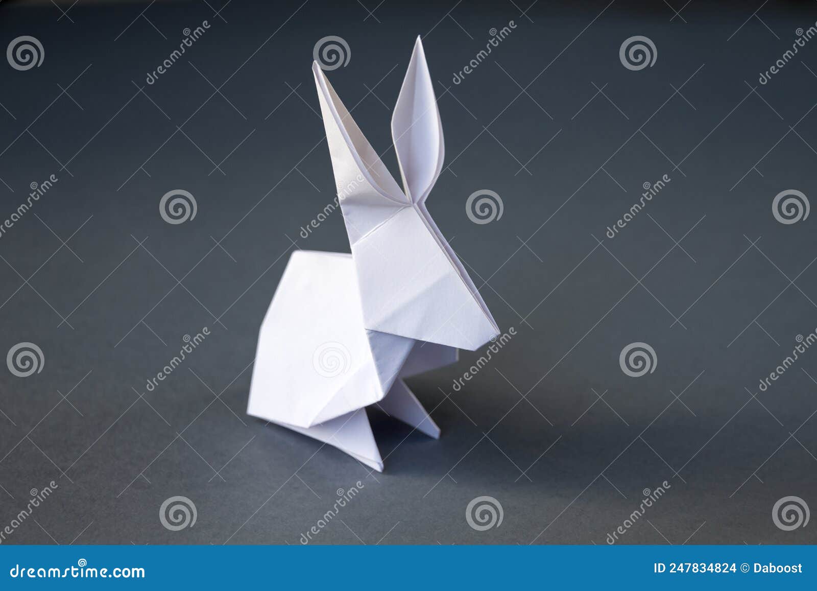 White Paper Rabbit Origami Isolated on a Grey Background Stock Photo ...