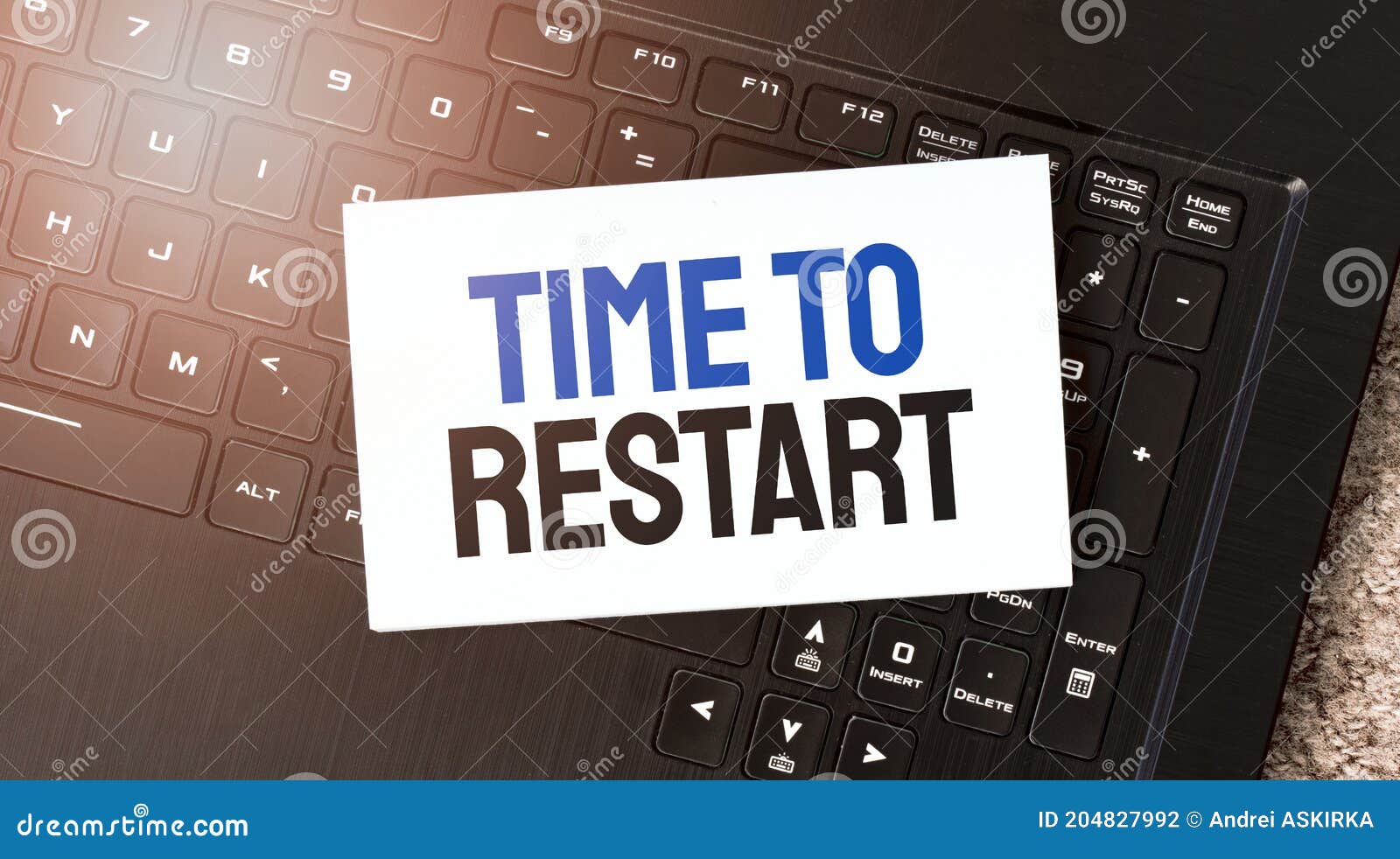White Paper Sheet with Text Time To Restart on the Black Laptop Stock ...
