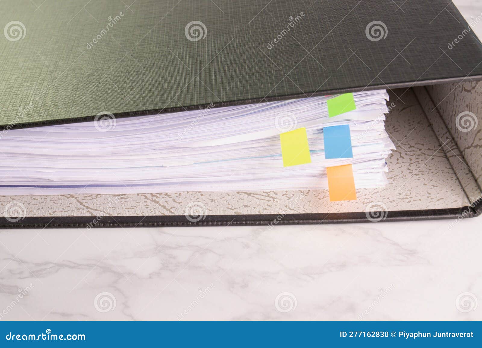 White Paper Stack in Folder File for a Business Contract, Income ...