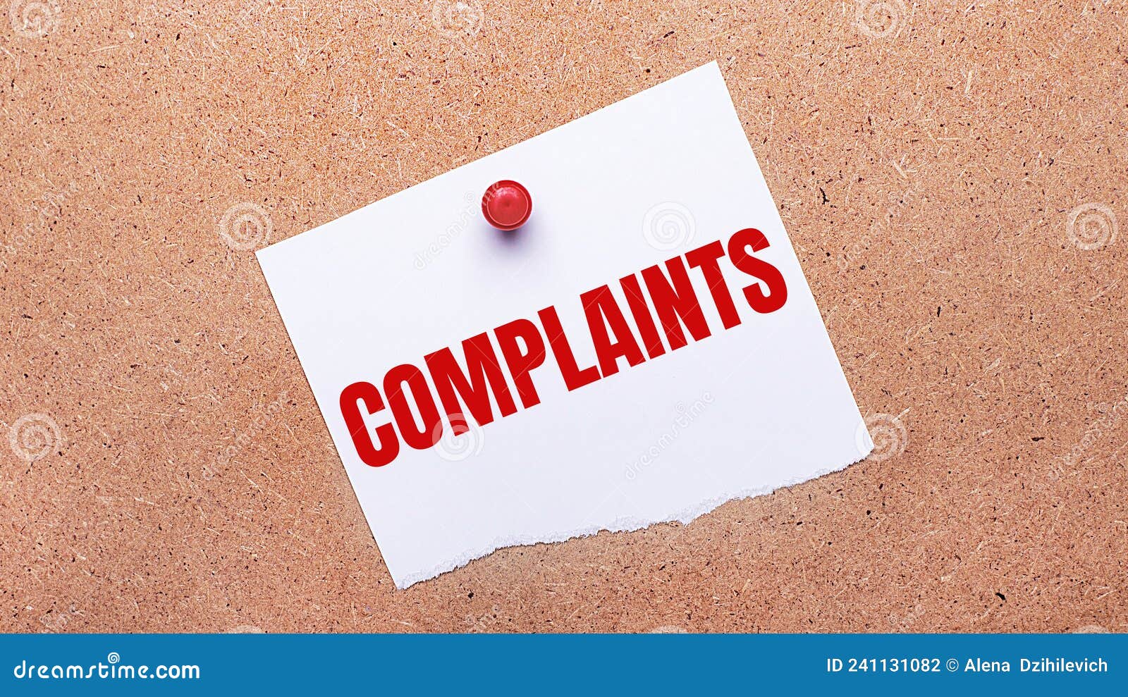 White Paper with the Text COMPLAINTS is Attached To the Wooden ...