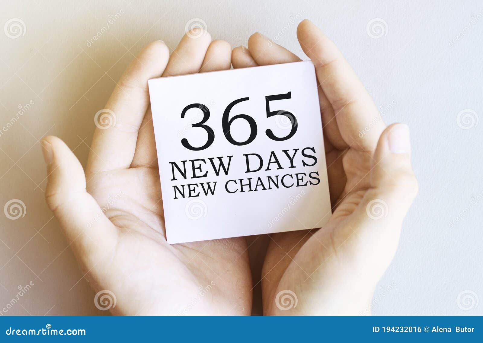 White Paper with Text 365 New Days New Chances in Male Hands on a White ...