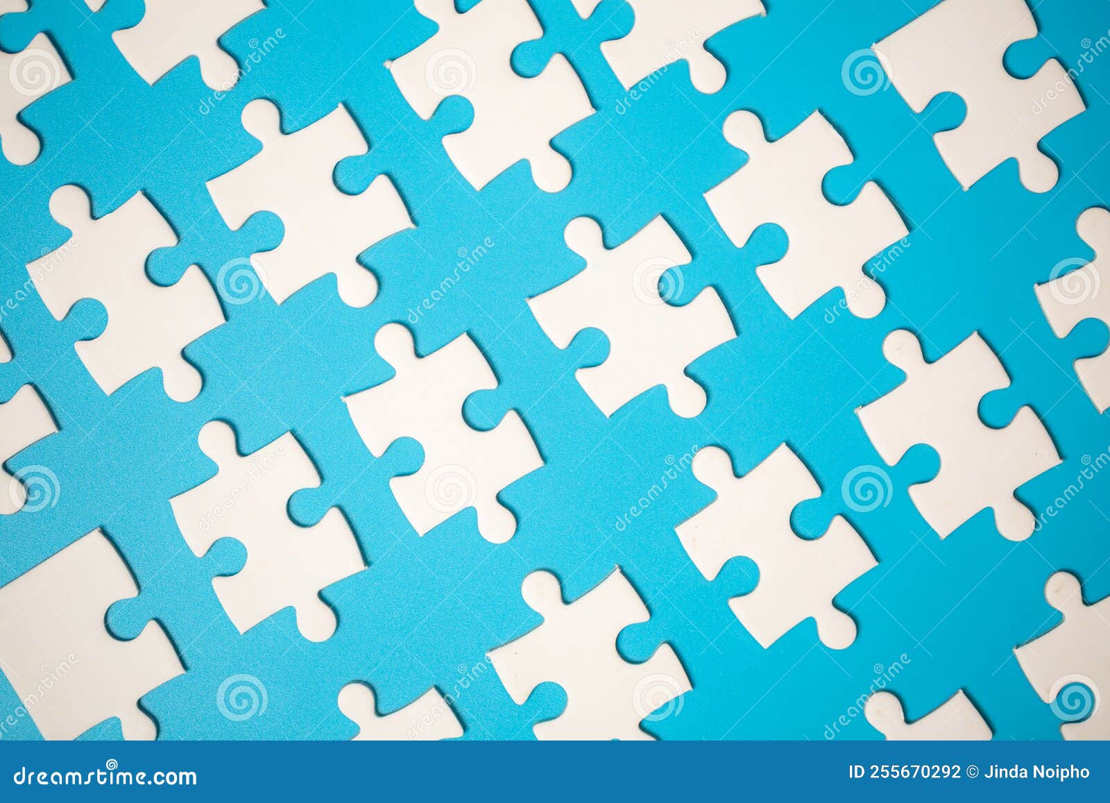 White Part of Jigsaw Puzzle Pieces on Blue Background. Concepts of ...