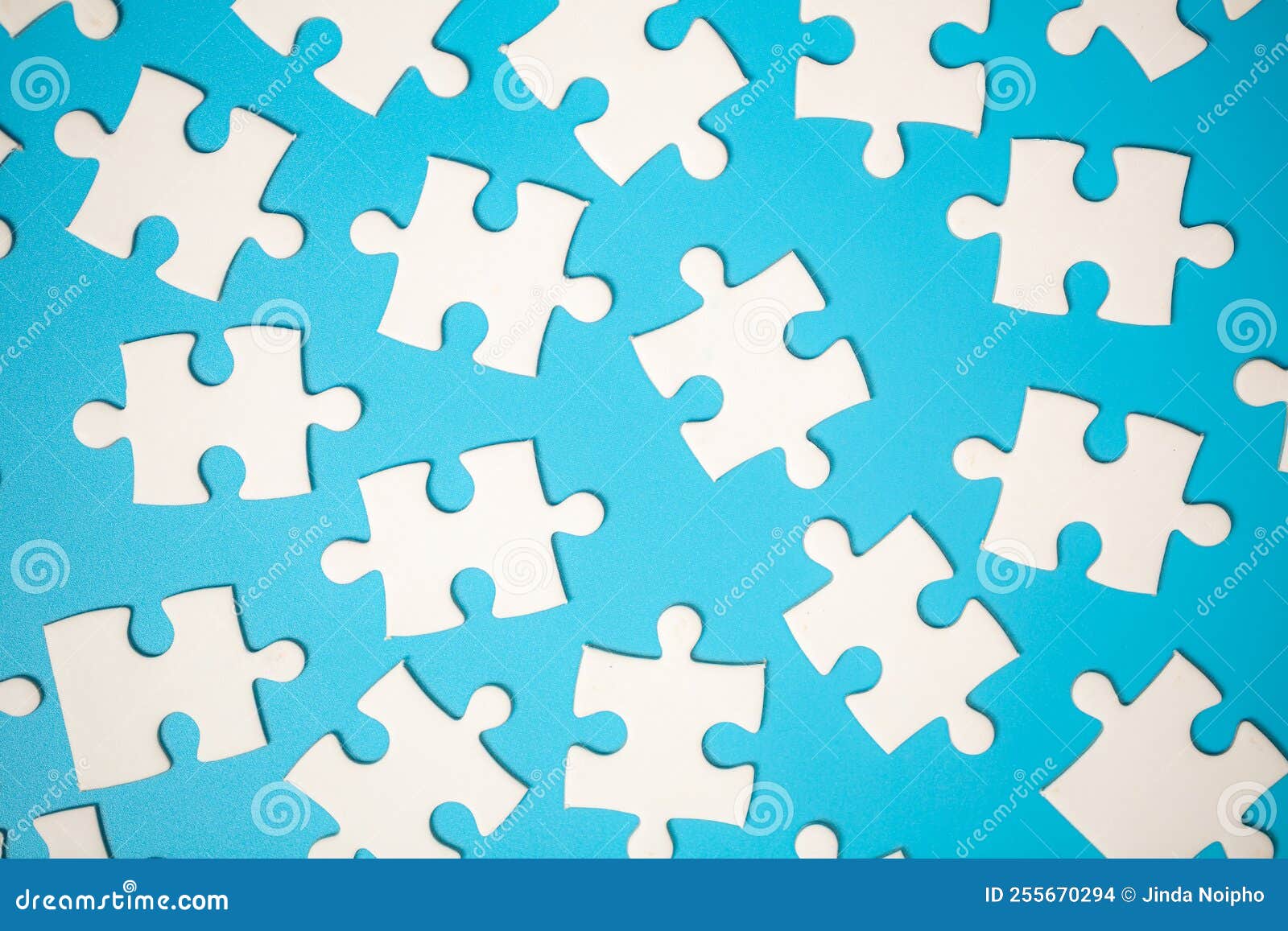 White Part of Jigsaw Puzzle Pieces on Blue Background. Concepts of ...
