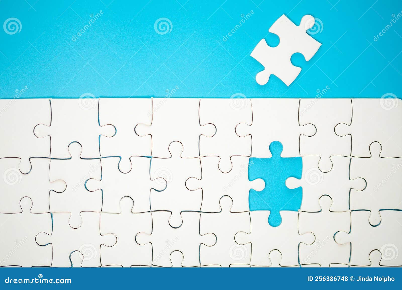 White Part of Jigsaw Puzzle Pieces on Blue Background. Concepts of ...
