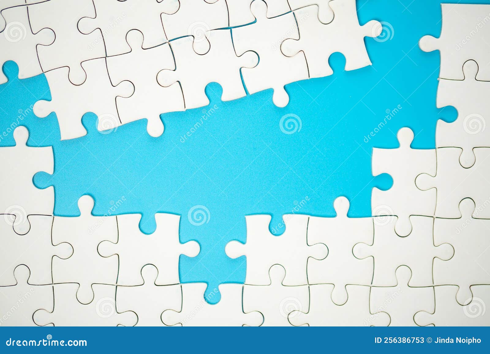 White Part of Jigsaw Puzzle Pieces on Blue Background. Concepts of ...