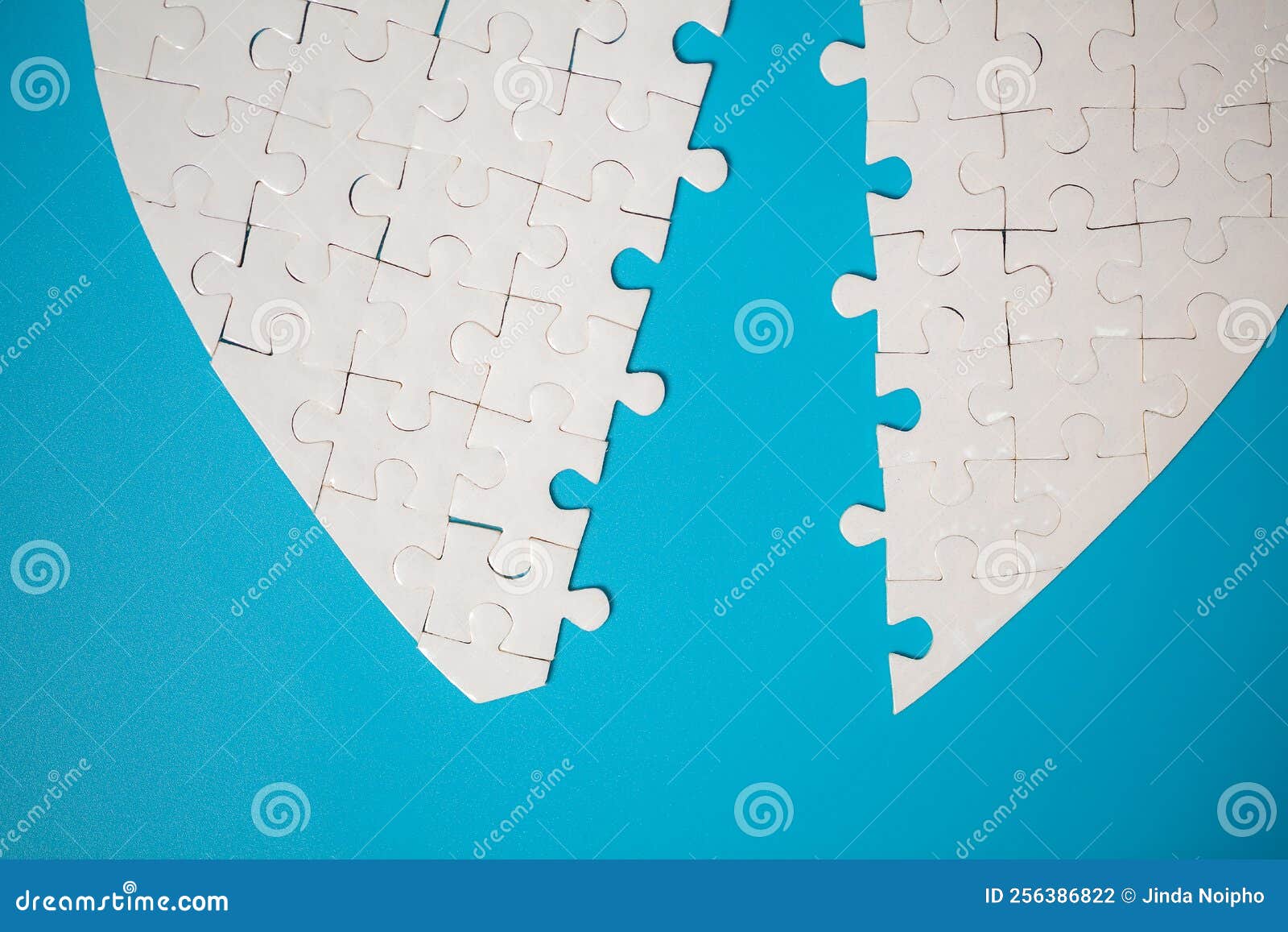 White Part of Jigsaw Puzzle Pieces on Blue Background. Concepts of ...
