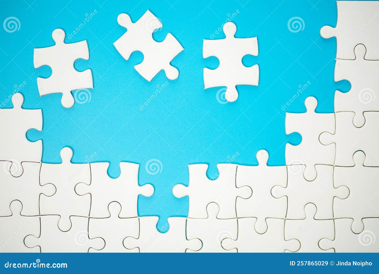 White Part of Jigsaw Puzzle Pieces on Blue Background. Concepts of ...